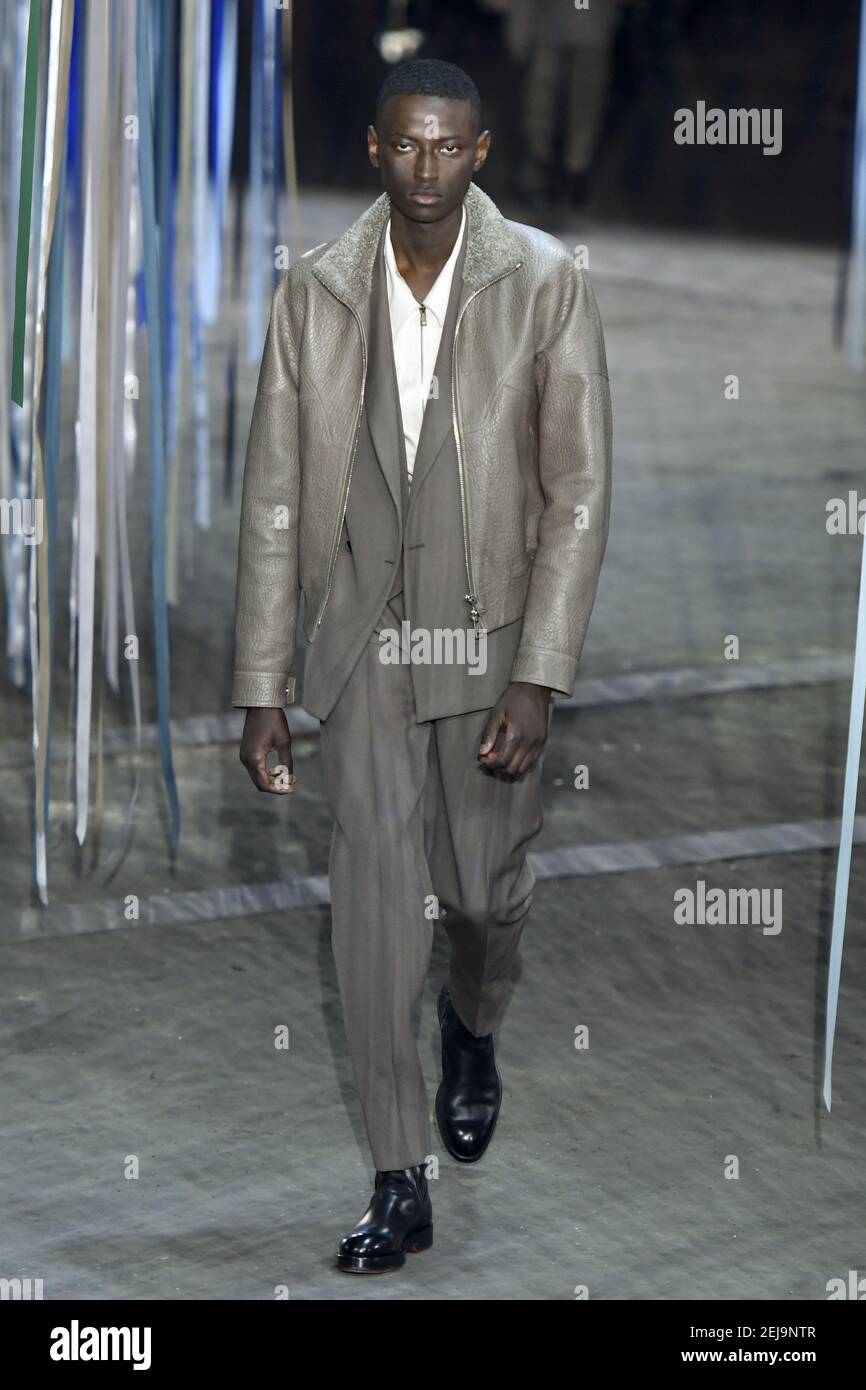 Model walks on the runway during the Ermengildo Zegna menswear show ...
