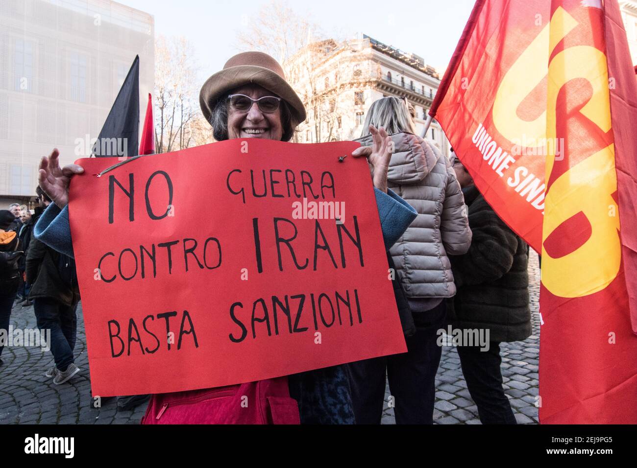 Demonstrator holding a placard during the protest. At Piazza Barberini ...