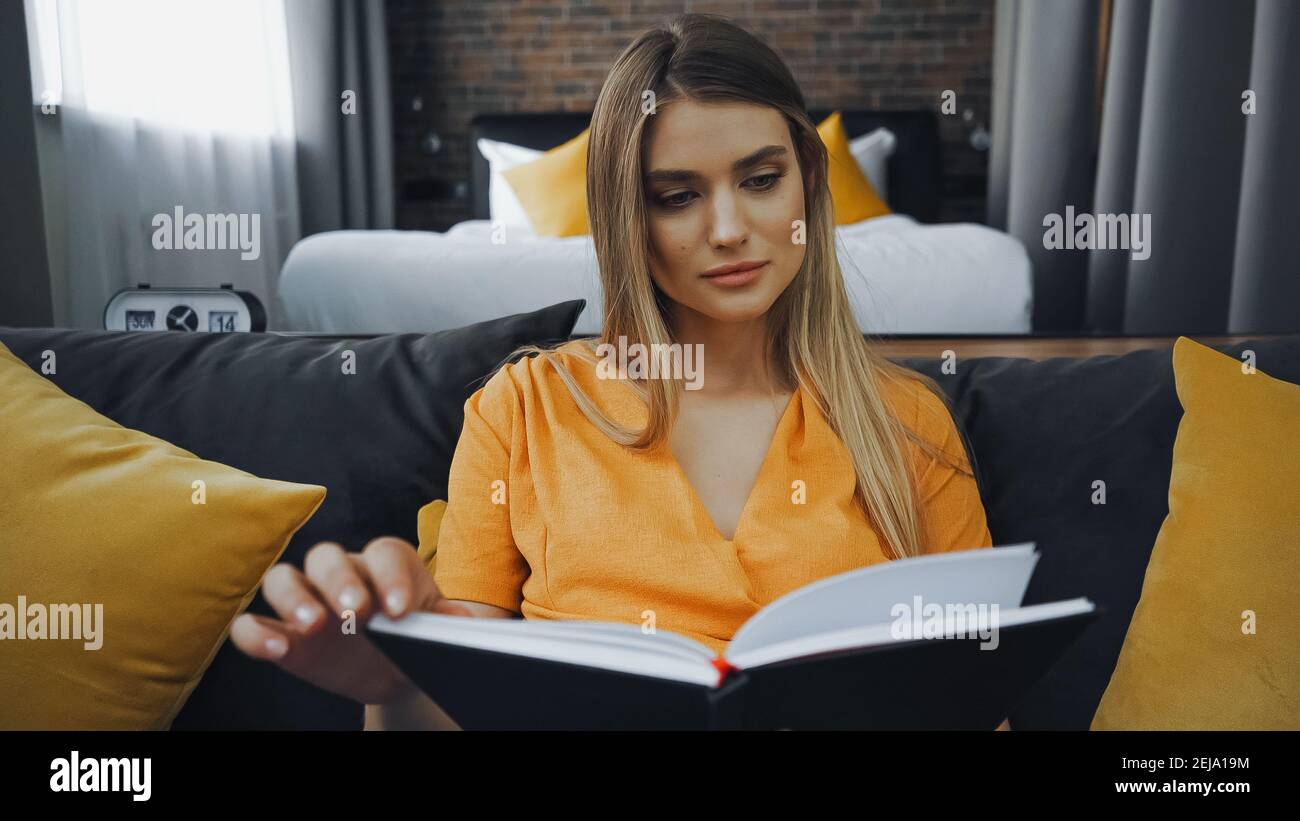 Smart woman reading book hi-res stock photography and images - Alamy