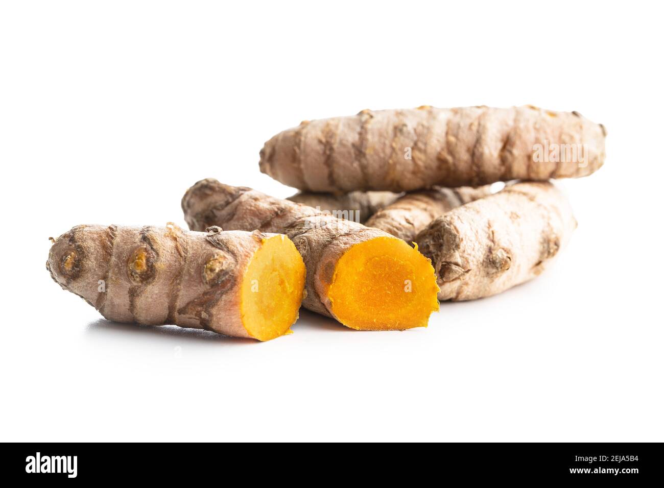 Indian turmeric root. Turmeric spice. Yellow turmeric isolated on white ...