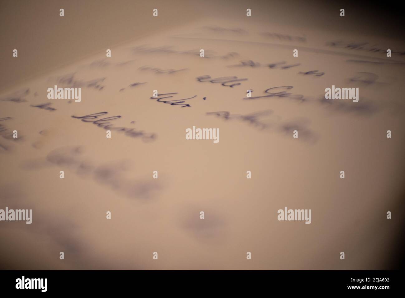 Blurred image of a vintage handwritten letter Stock Photo - Alamy