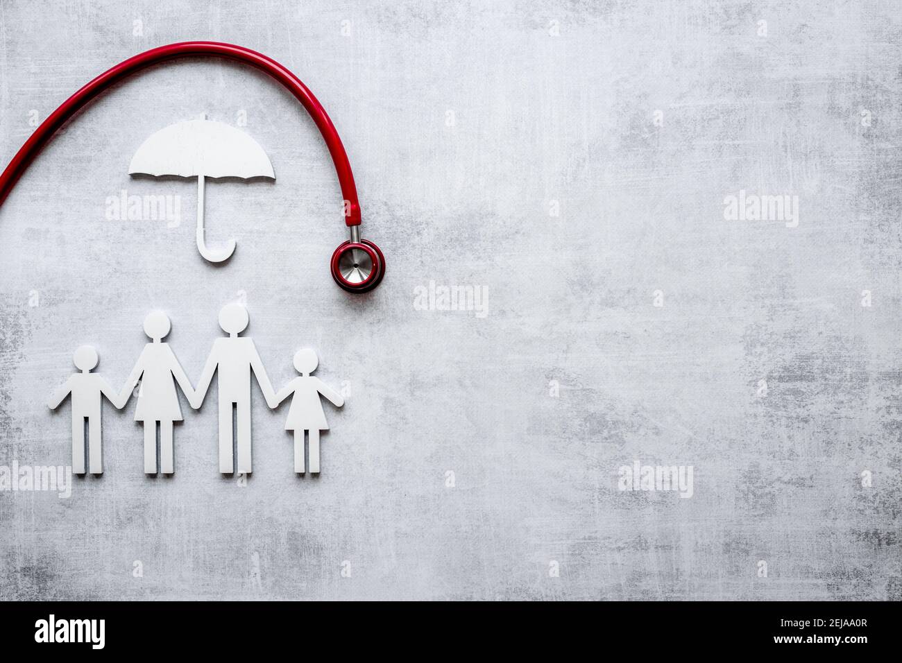 Medical care concept. Family figure with stethoscope, top view Stock ...