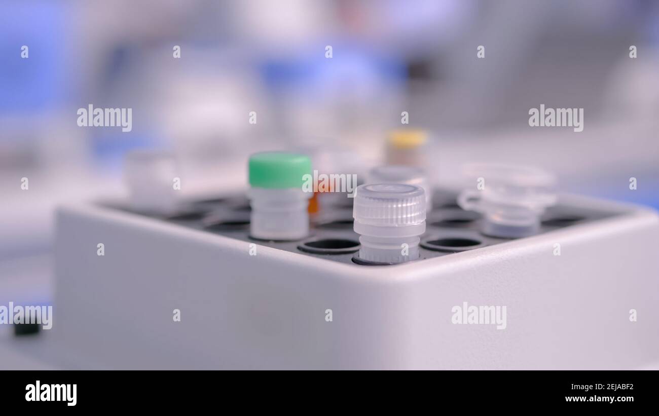 Plate shaker for mixing biological samples in vials at factory ...