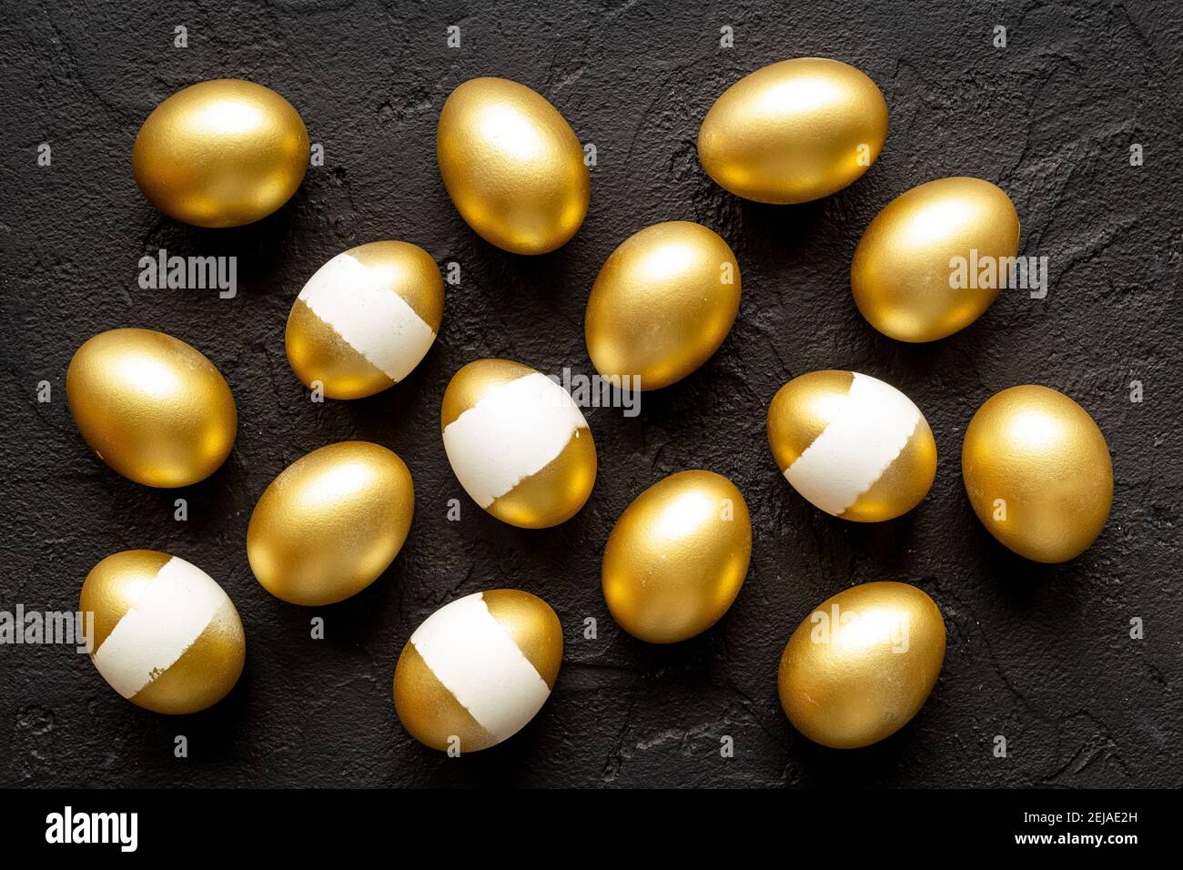 Pattern of golden eggs. Easter decoration. Wealth and good luck concept ...
