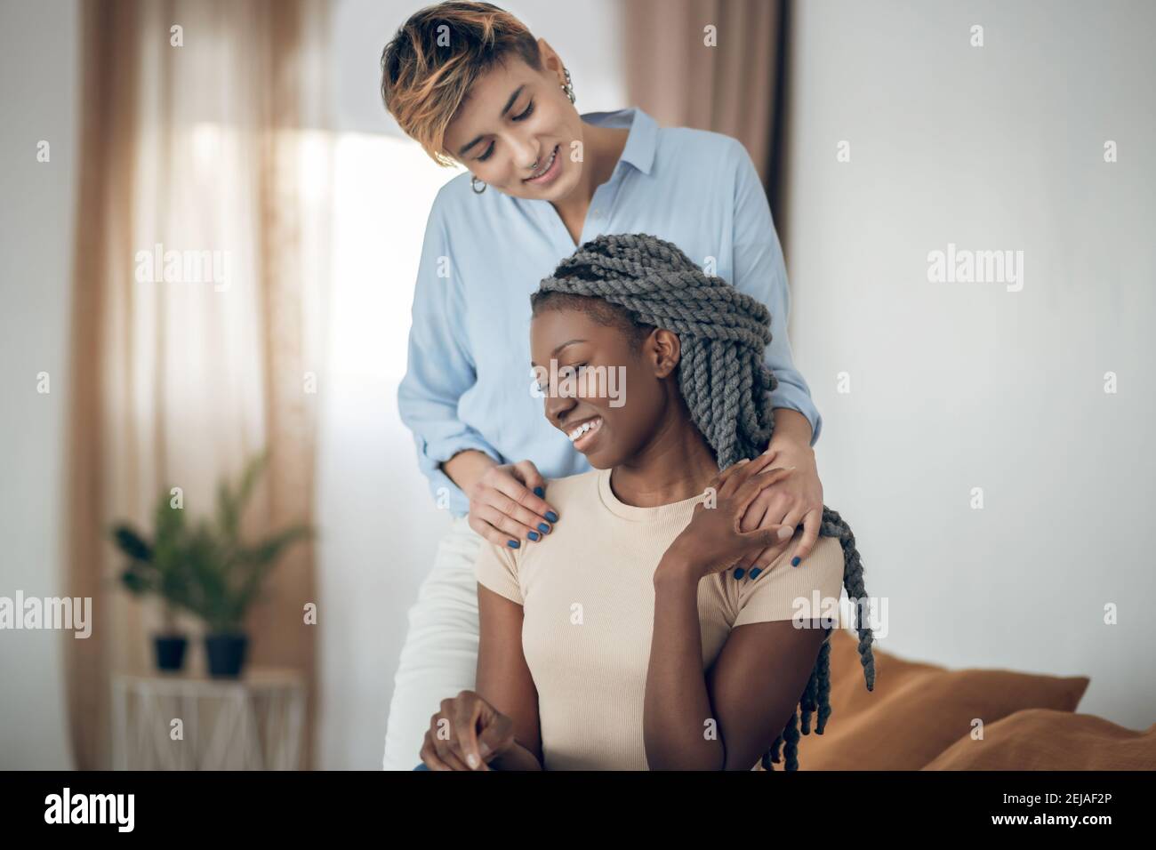 Two girls spending time together and looking romantic Stock Photo - Alamy