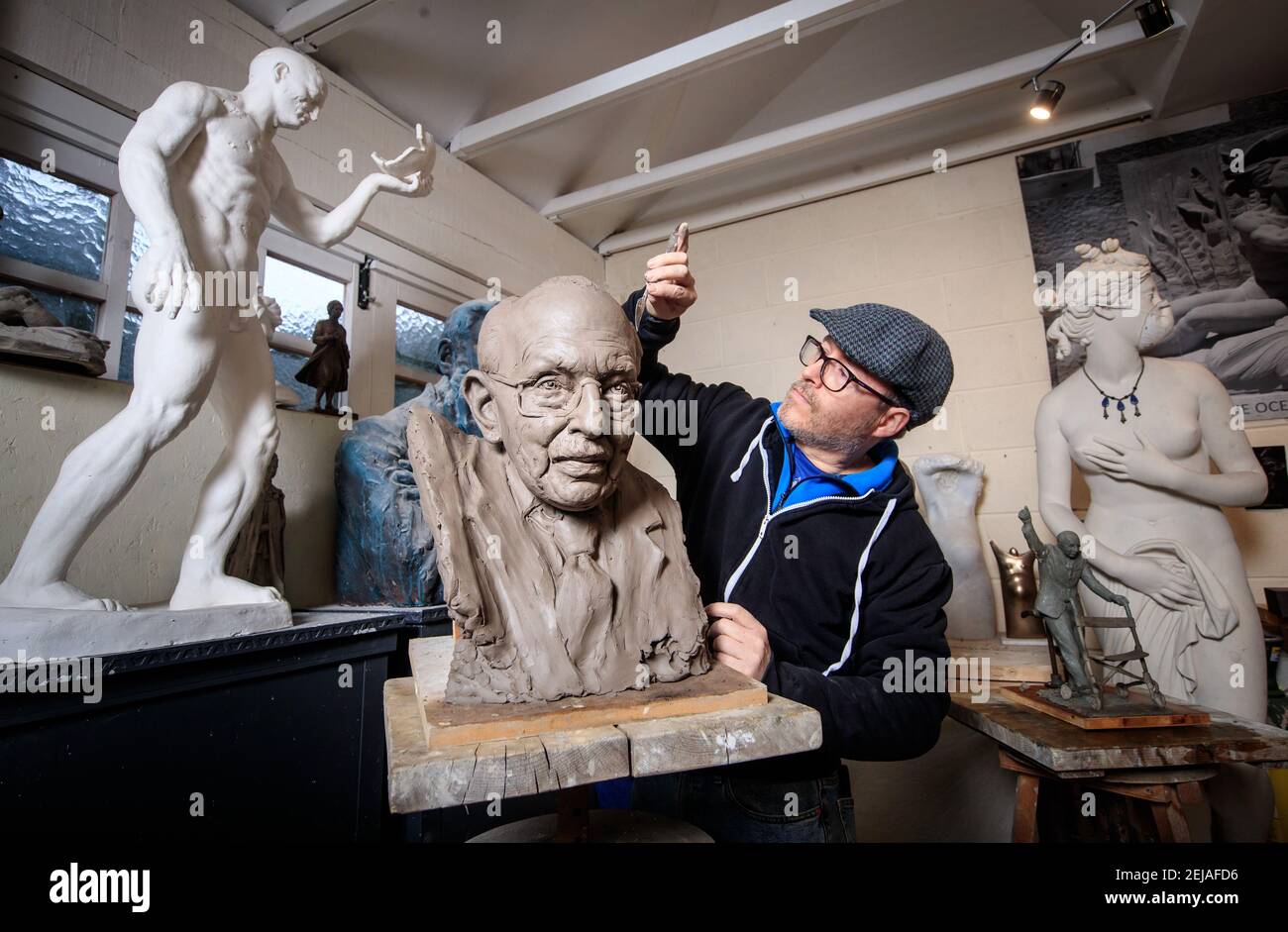 Sculptor Andrian Melka at his studio in York, working on a clay ...