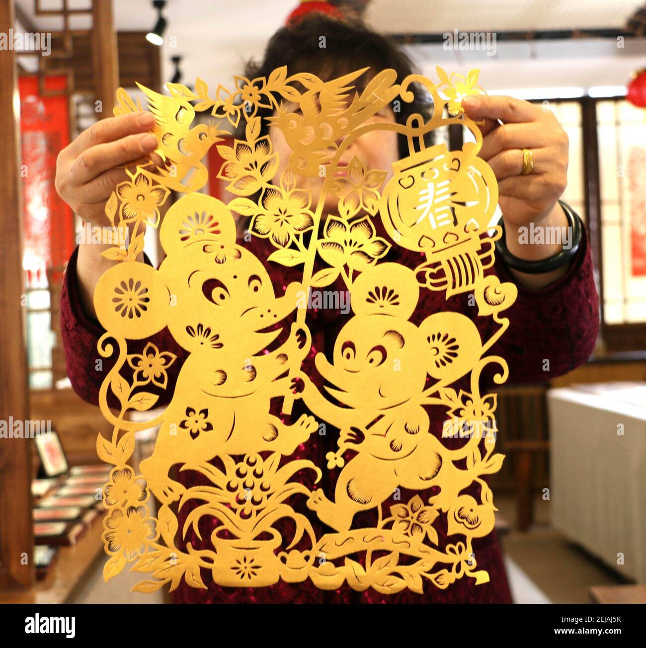 Chinese paper-cut artist Shi Junfeng shows her latest rat-themed paper ...