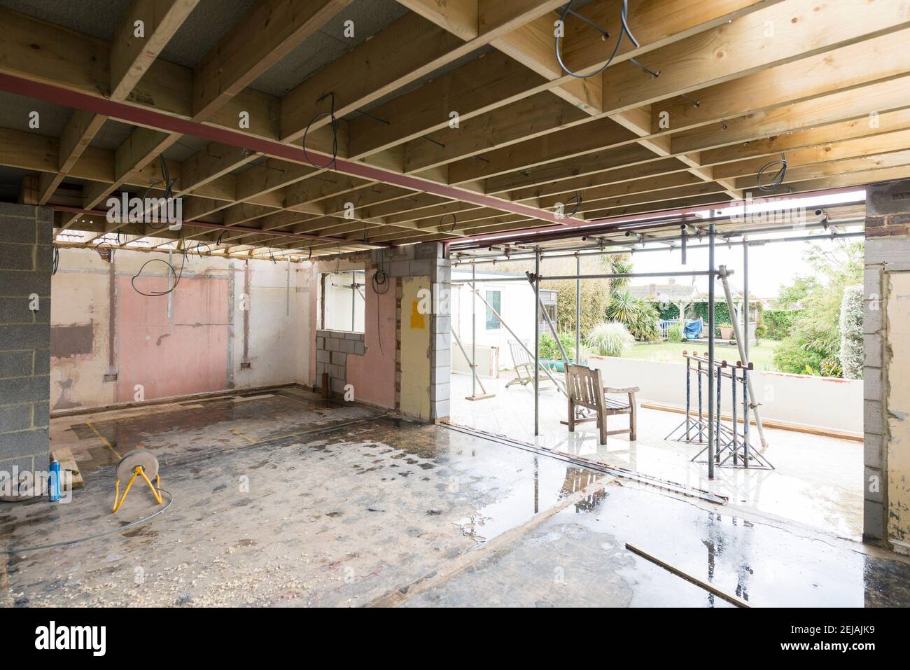 Work on a residential house to create more space by extending and ...