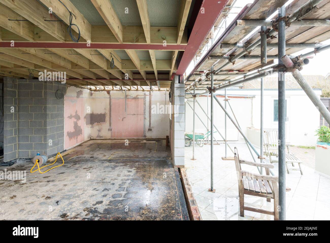 Work on a residential house to create more space by extending and ...