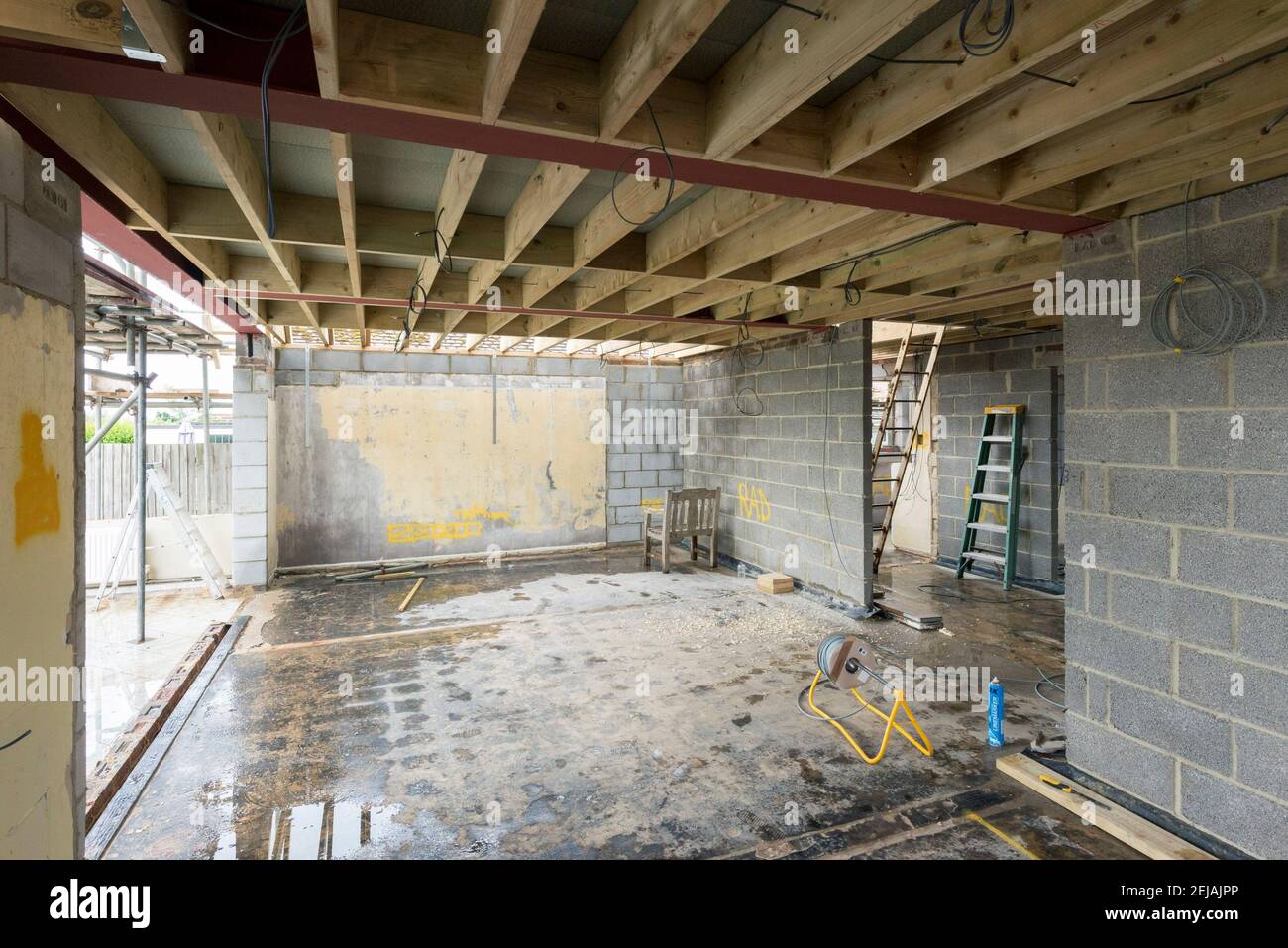 Work on a residential house to create more space by extending and ...