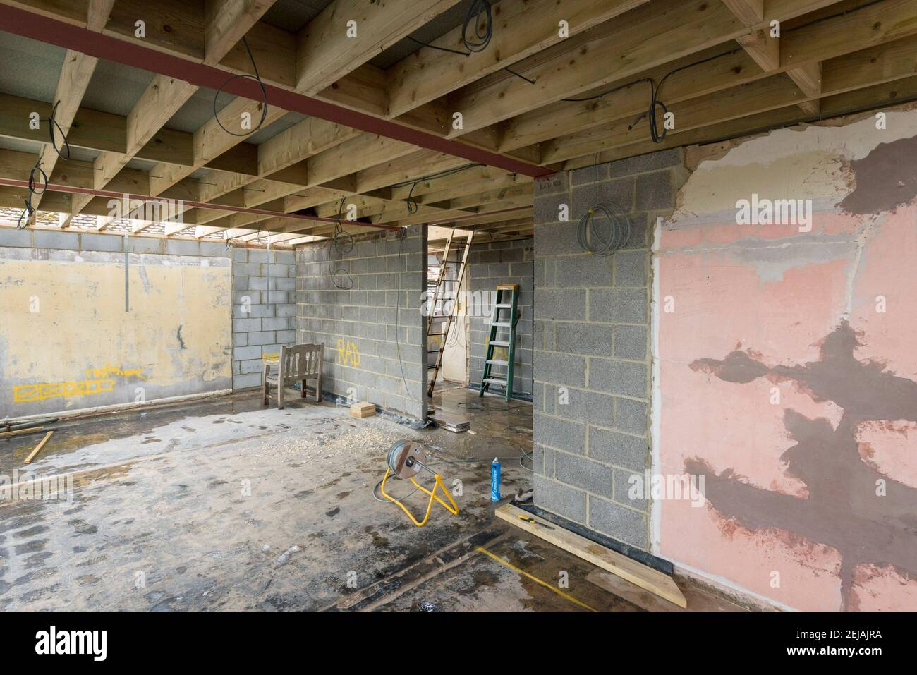 Work on a residential house to create more space by extending and ...