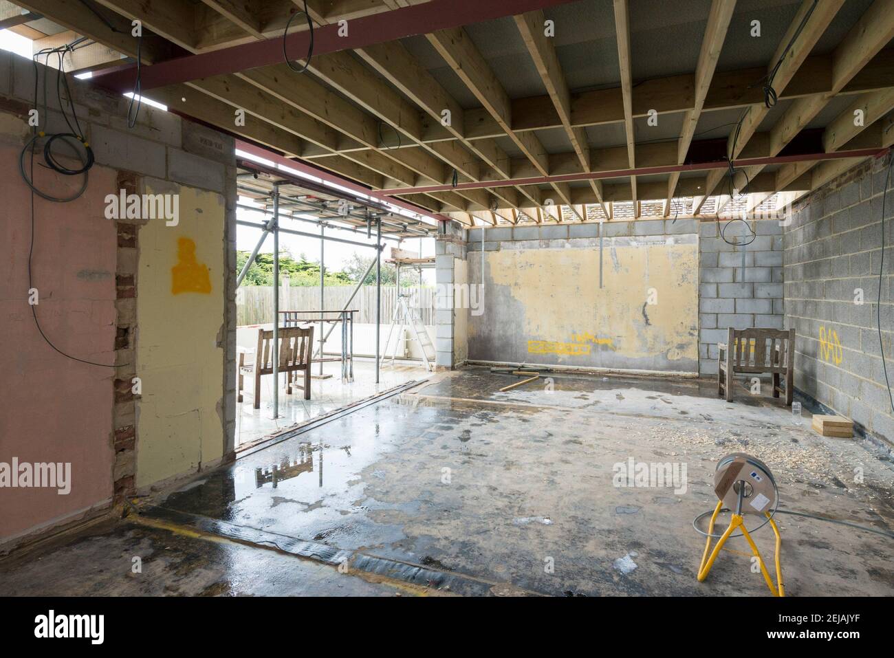 Work on a residential house to create more space by extending and ...