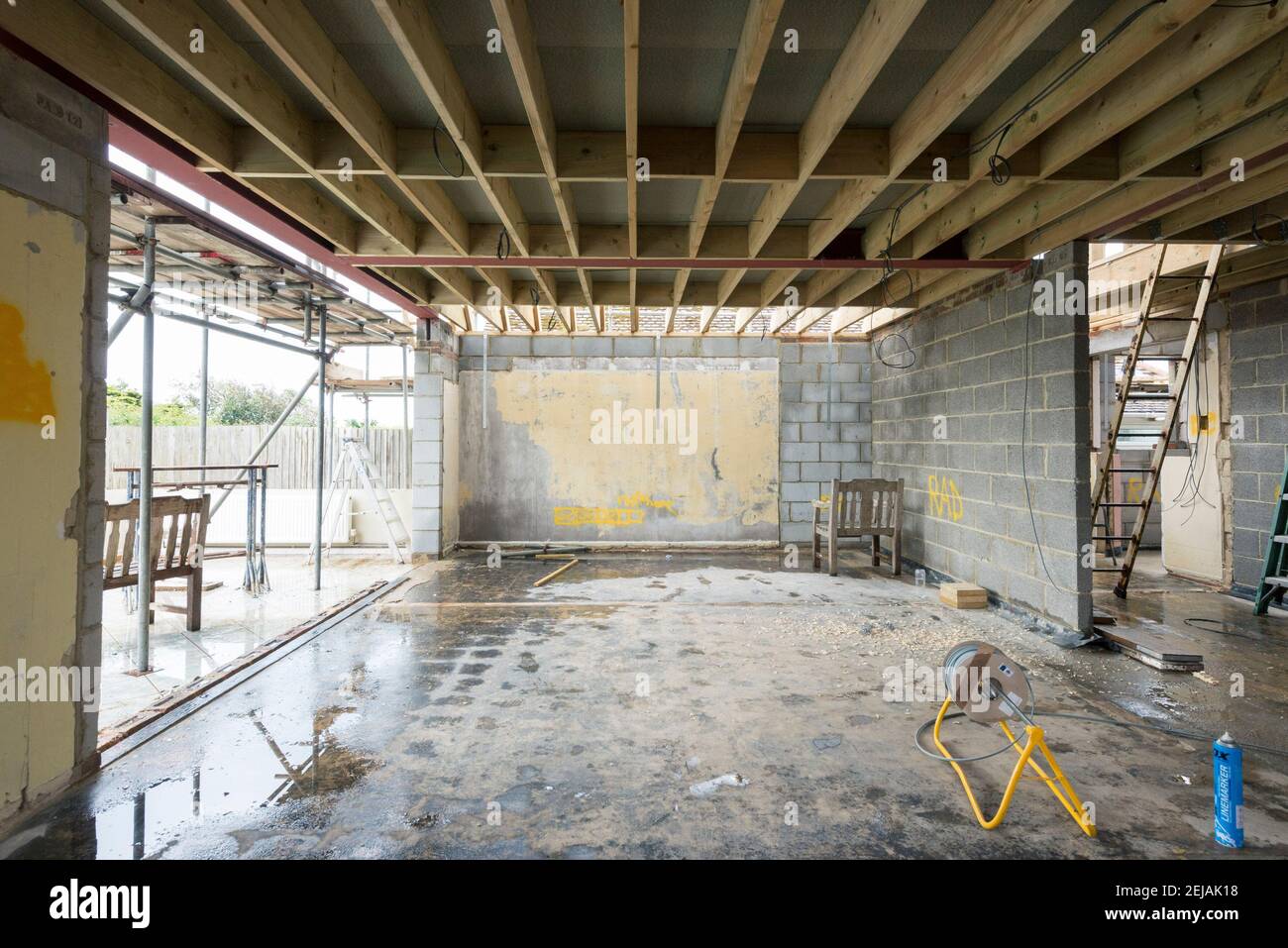 Work on a residential house to create more space by extending and ...