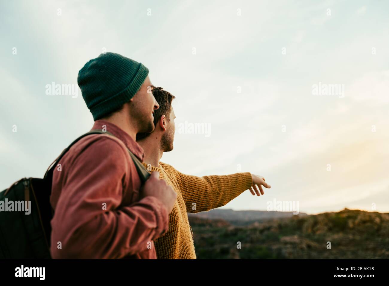 Two caucasian male hiking in wilderness pointing in the distance Stock ...