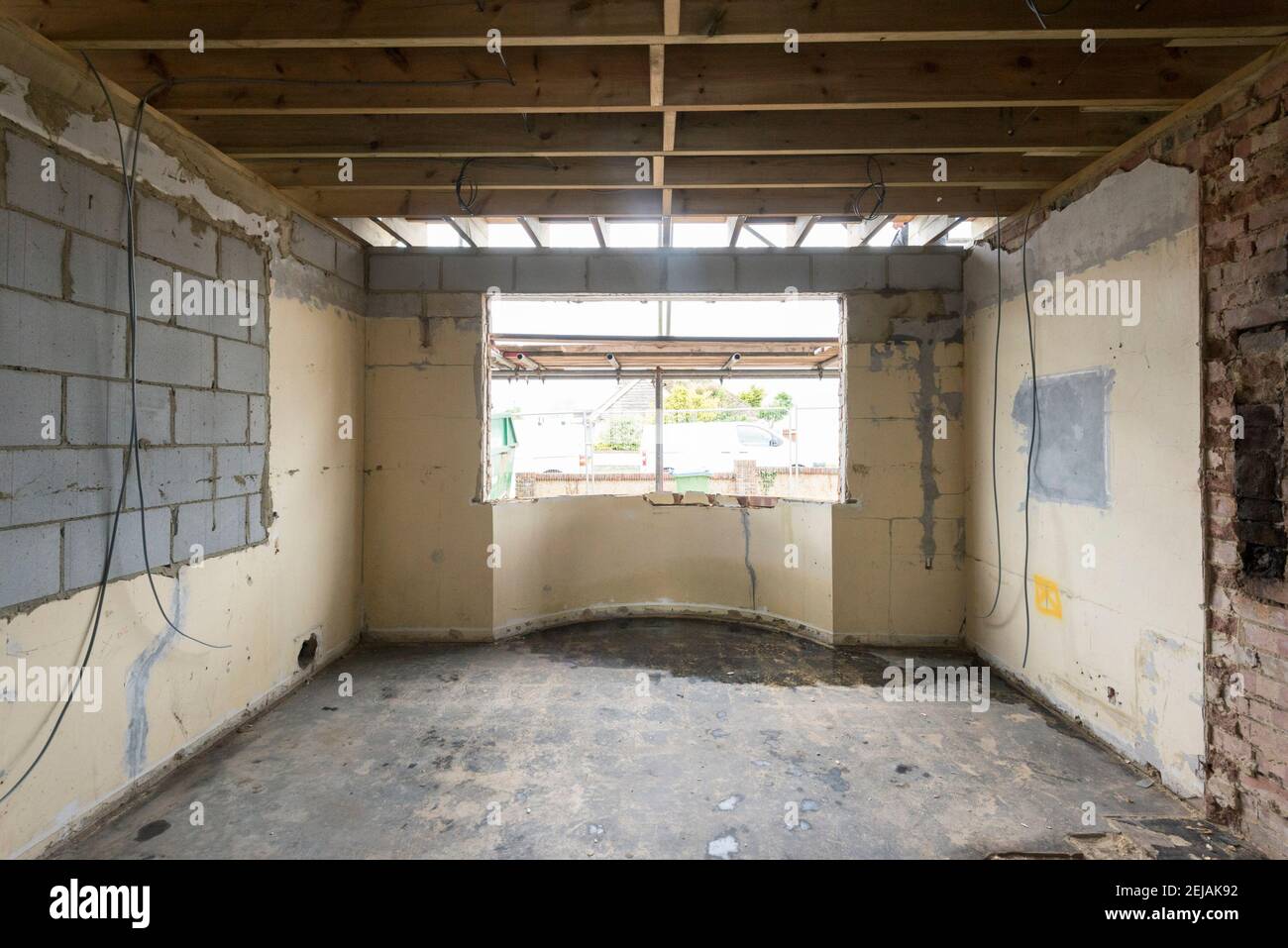 Work on a residential house to create more space by extending and ...