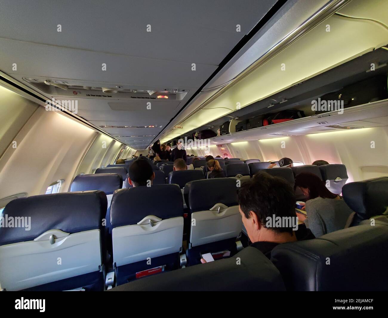 Wide angle, interior of cabin of Southwest Airlines jet aircraft during ...