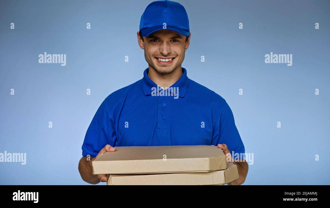 Man holding pizza boxes hi-res stock photography and images - Alamy