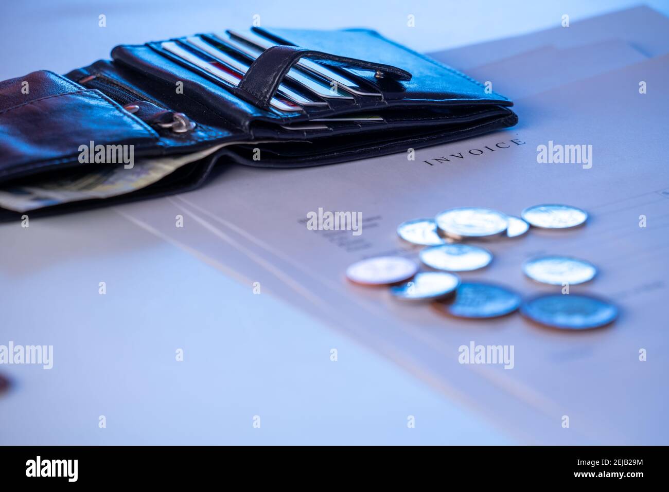 Fill Invoice for payment form and wallet and money coin Stock Photo - Alamy