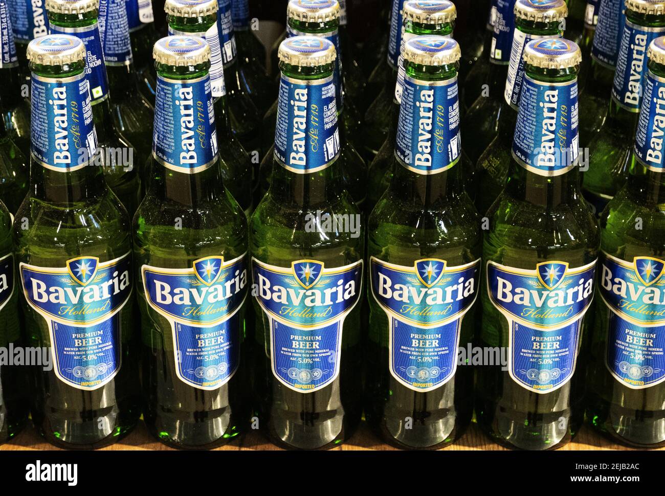 Bavaria beer bottles seen in a store shelf. (Photo by Igor Golovniov ...