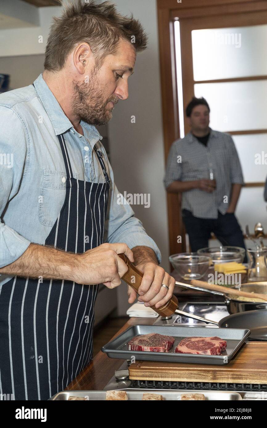 Australian celebrity chef Curtis Stone cooking ribeye steak sandwiches ...