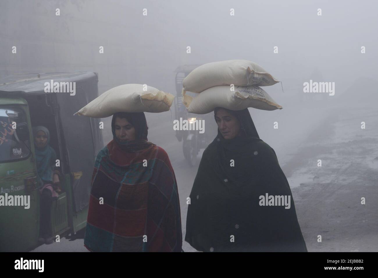 A view of the fog engulfs the provincial capital city while Pakistani ...