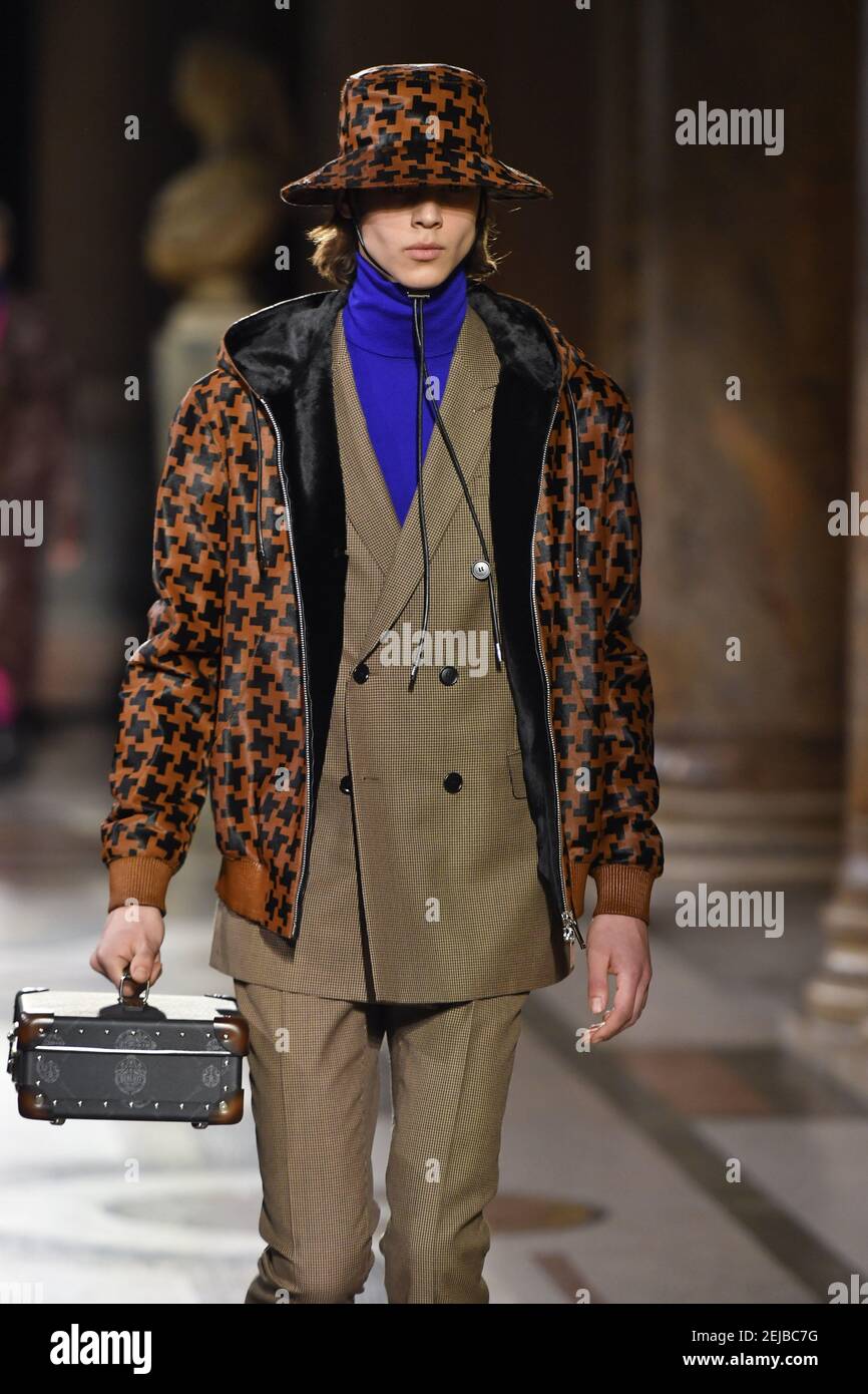 Model walks on the runway during the Berluti fashion show during Paris ...