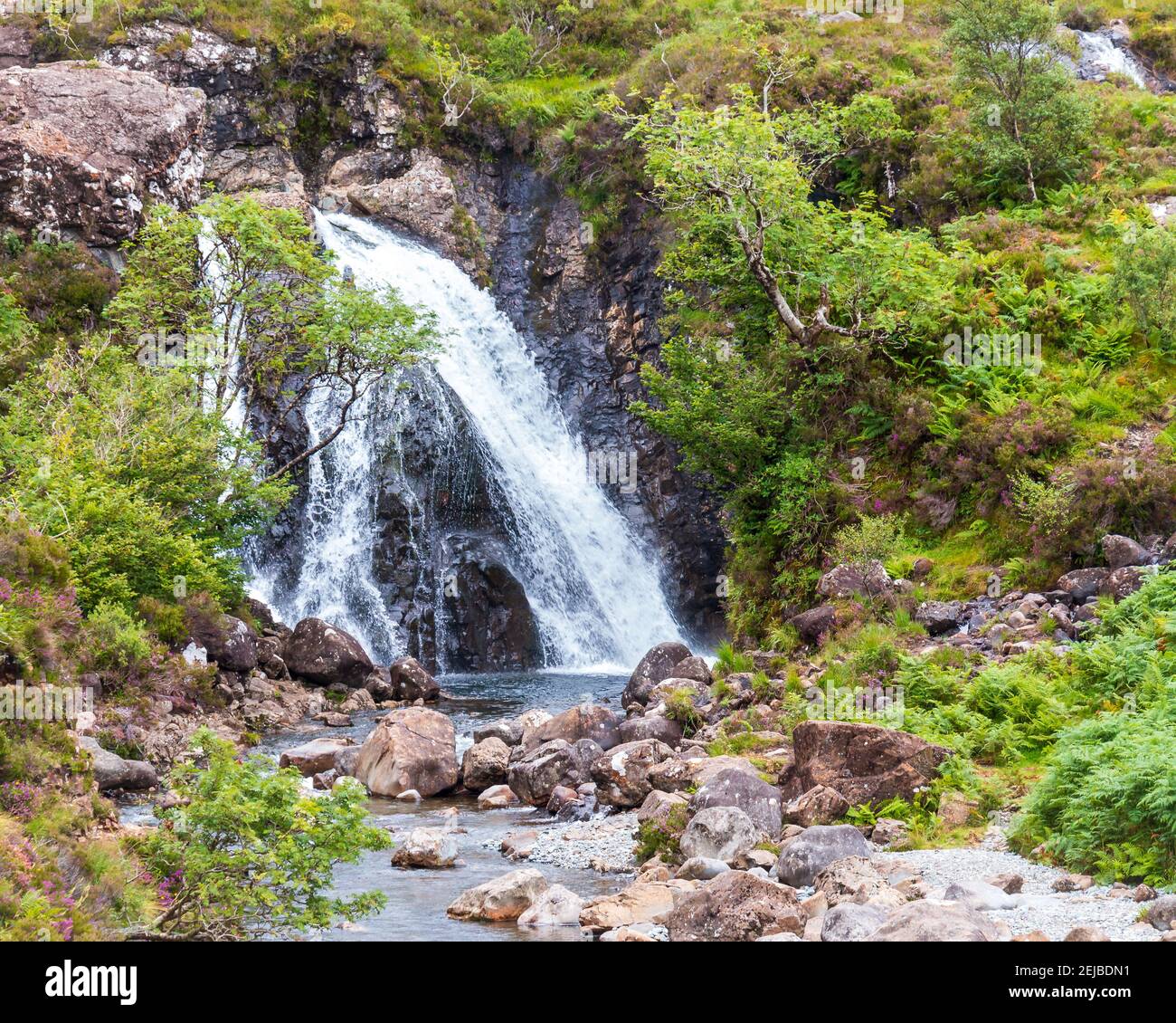One of few bigger waterfalls at the beautiful Fairy pools on Isle of ...