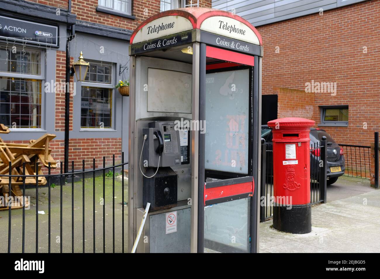 LEYTONSTONE, LONDON - 22ND FEBRUARY 2021: A vandalised phone box ...