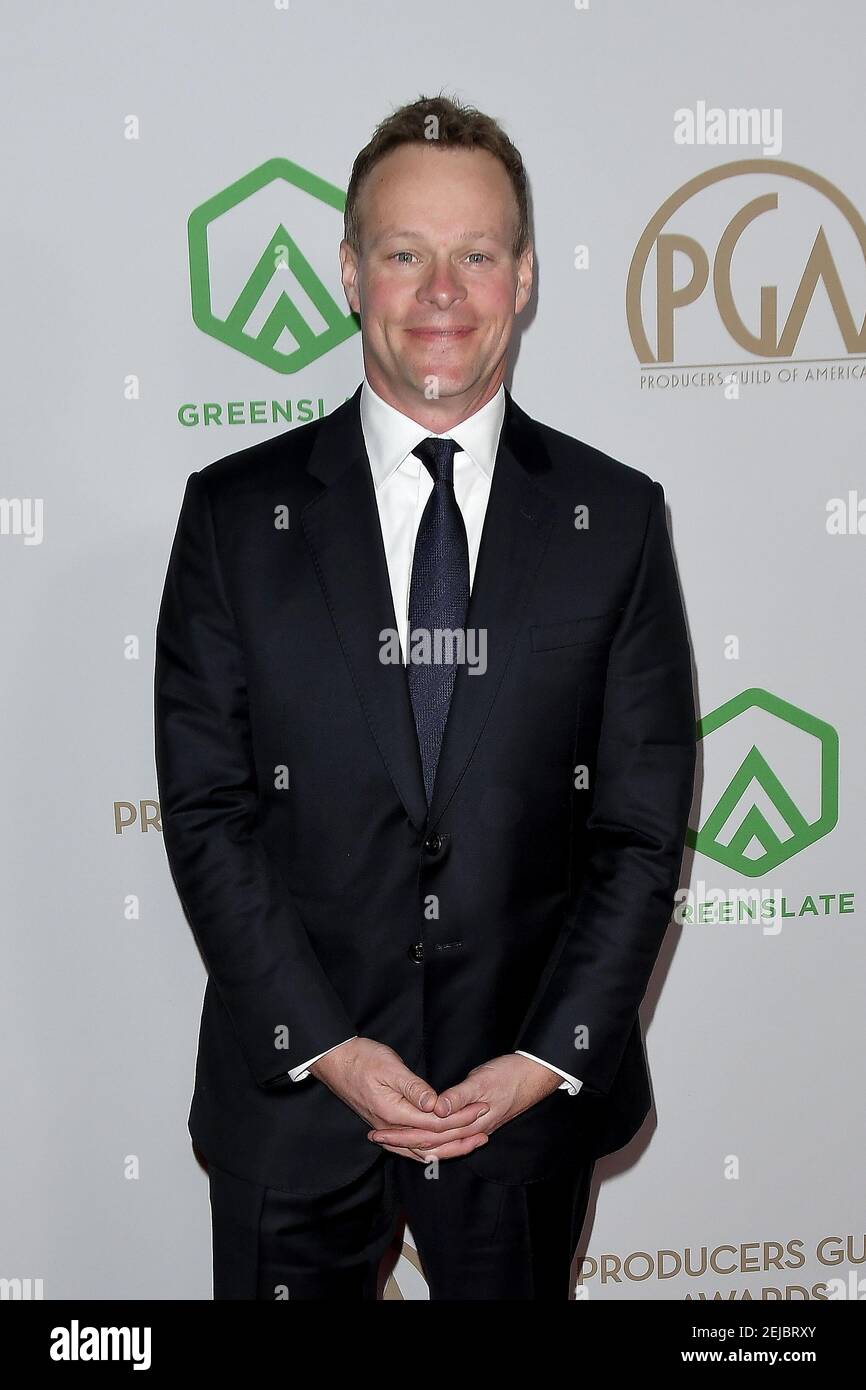 Chris Licht walks the carpet at the 31th Annual Producers Guild Awards ...