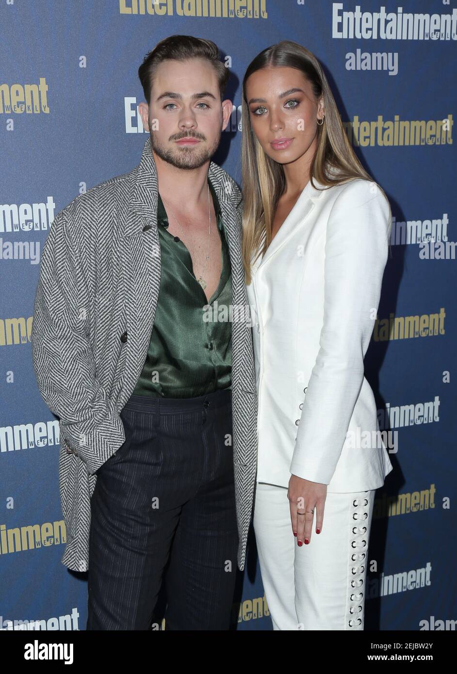 Dacre Montgomery, Liv Pollock walking the red carpet at Entertainment ...