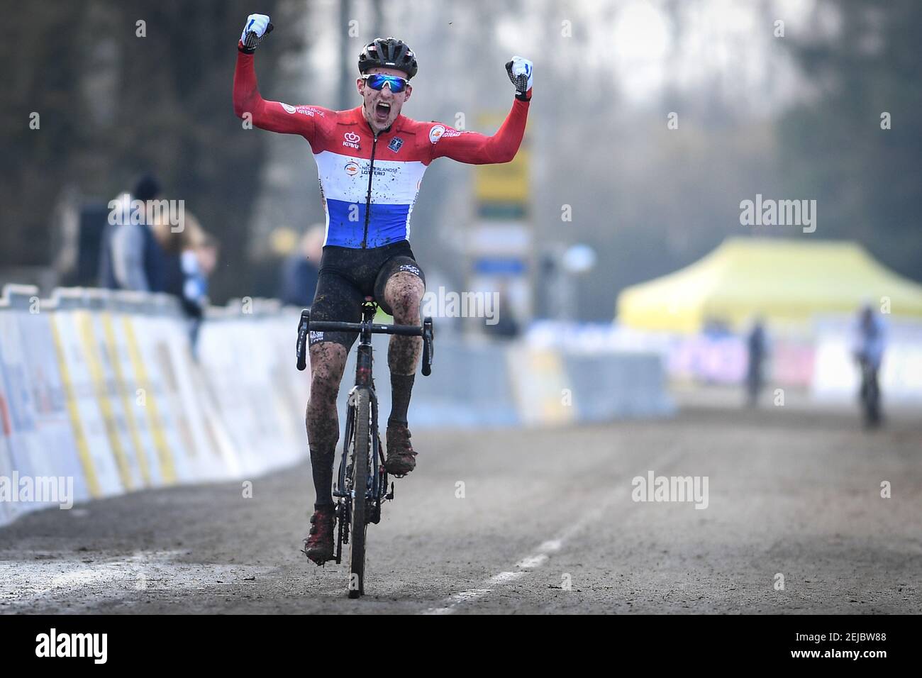 Dutch Ryan Kamp celebrates as he crosses the finish line to win the ...
