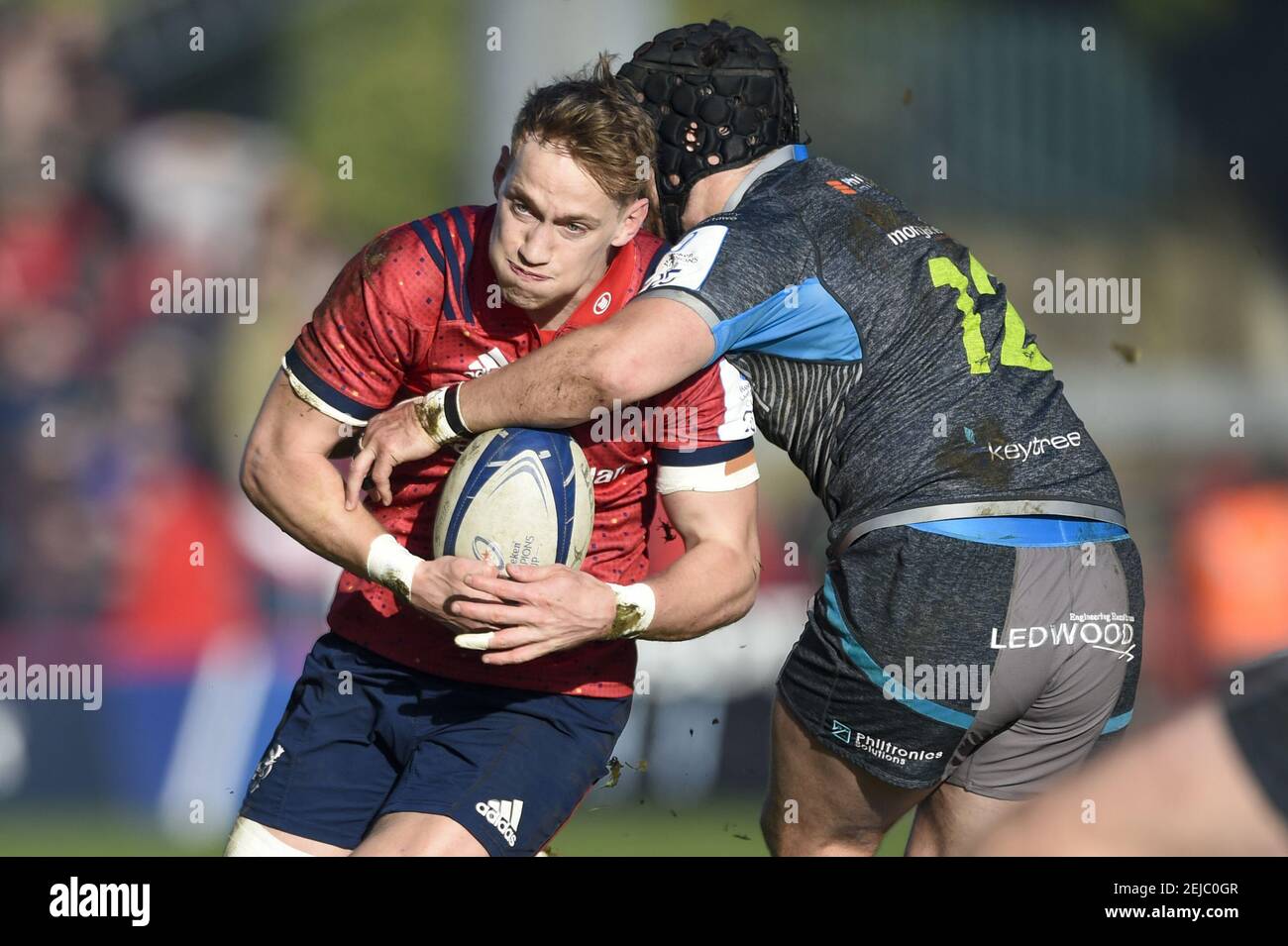 Mike Haley of Munster tackled by Dan Evans of Ospreys during the ...