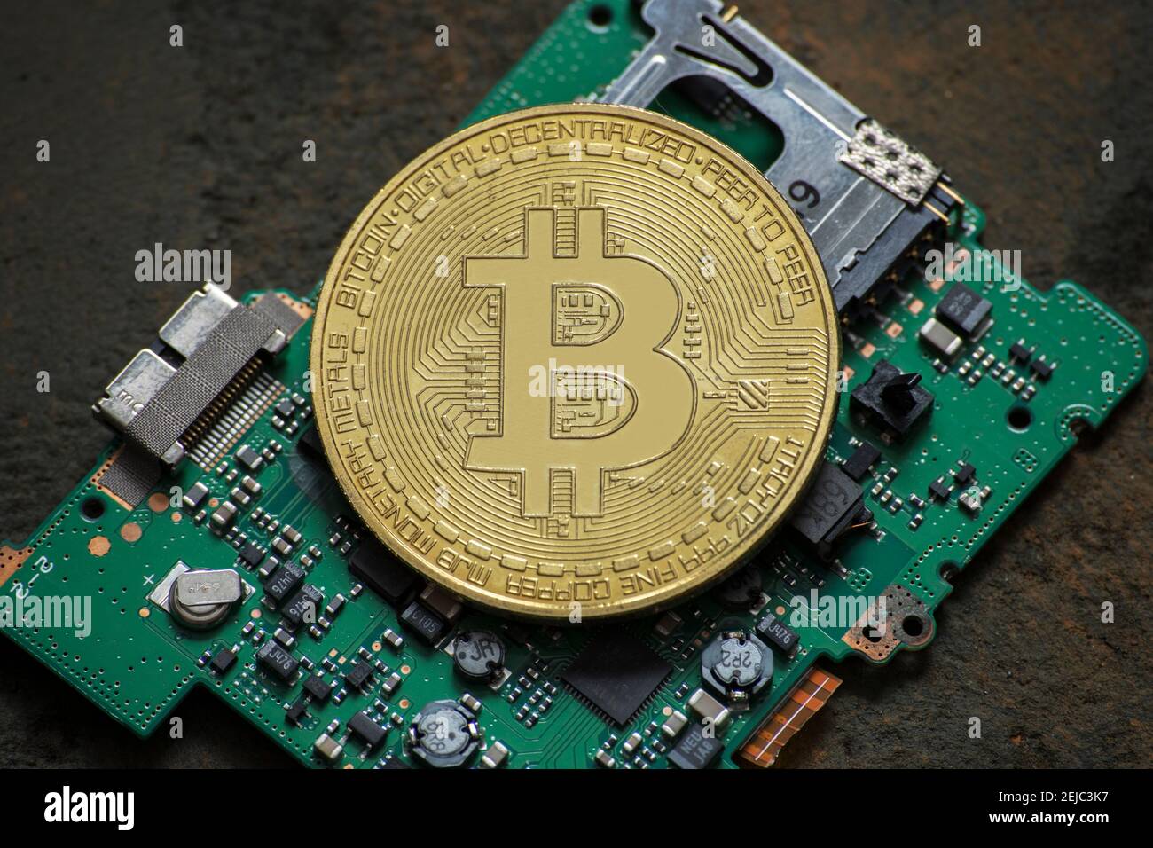 bitcoin logo coin on computer parts Stock Photo - Alamy