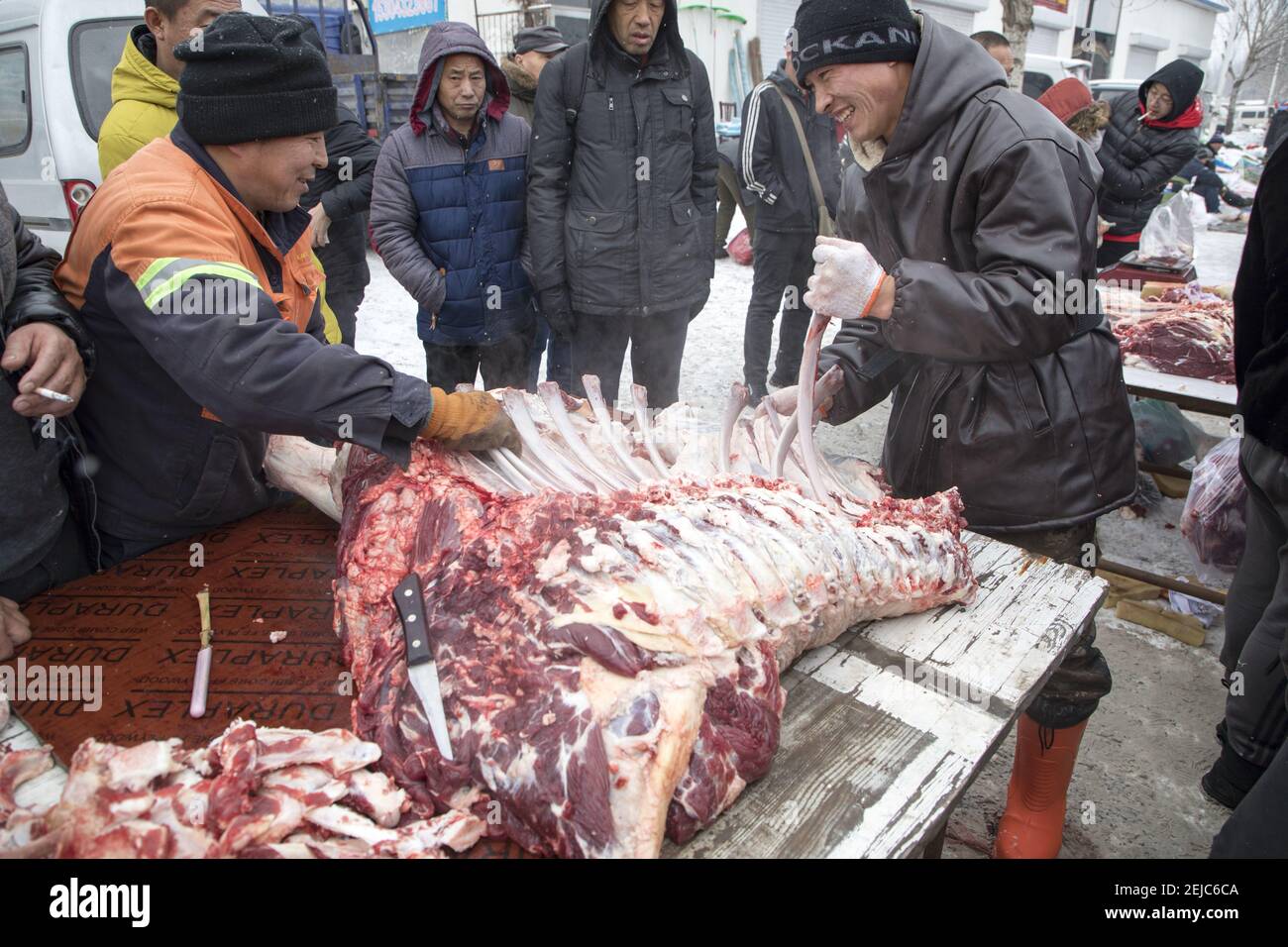 Jilin ,CHINA-Residents brave the wind and snow to buy Spring Festival ...