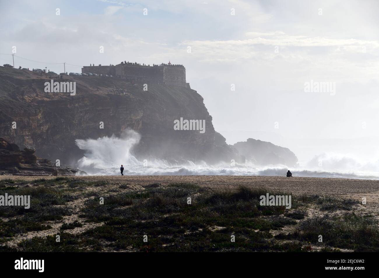 Huge wave breaking at Farol da Nazare Stock Photo - Alamy