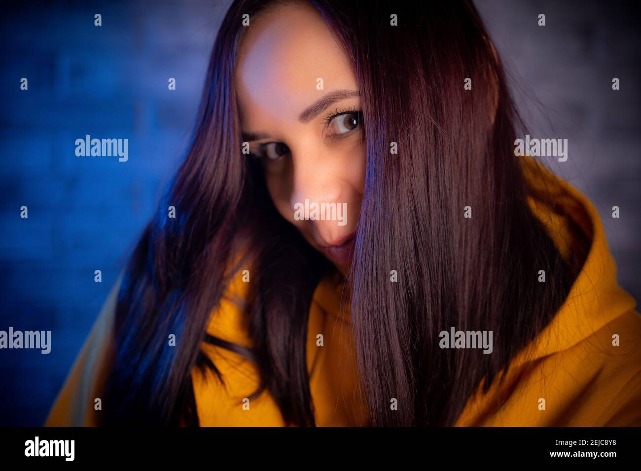 Woman coy shy expression hi-res stock photography and images - Alamy
