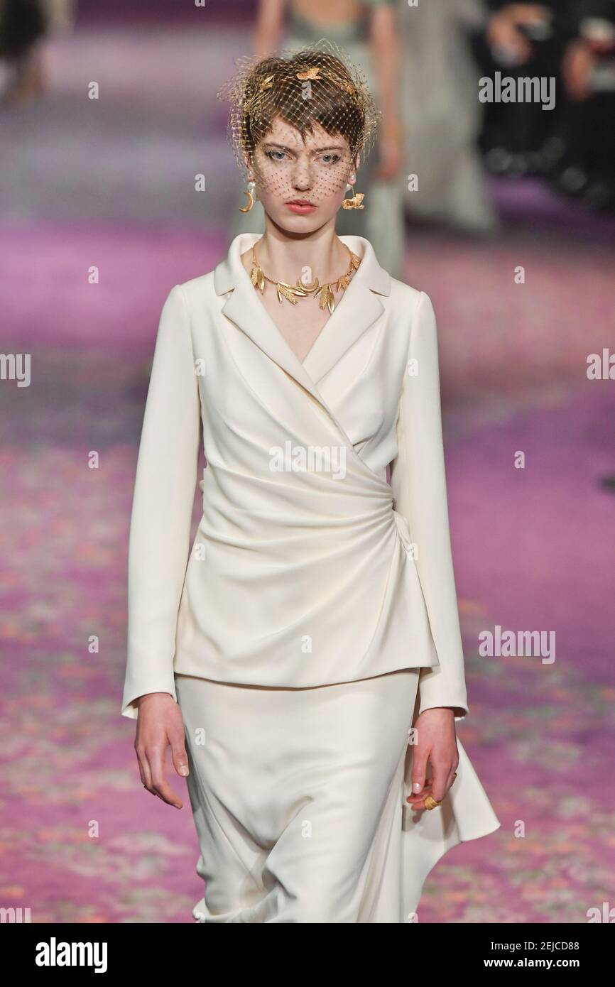 Model walks on the runway during the Dior Haute Couture fashion show ...