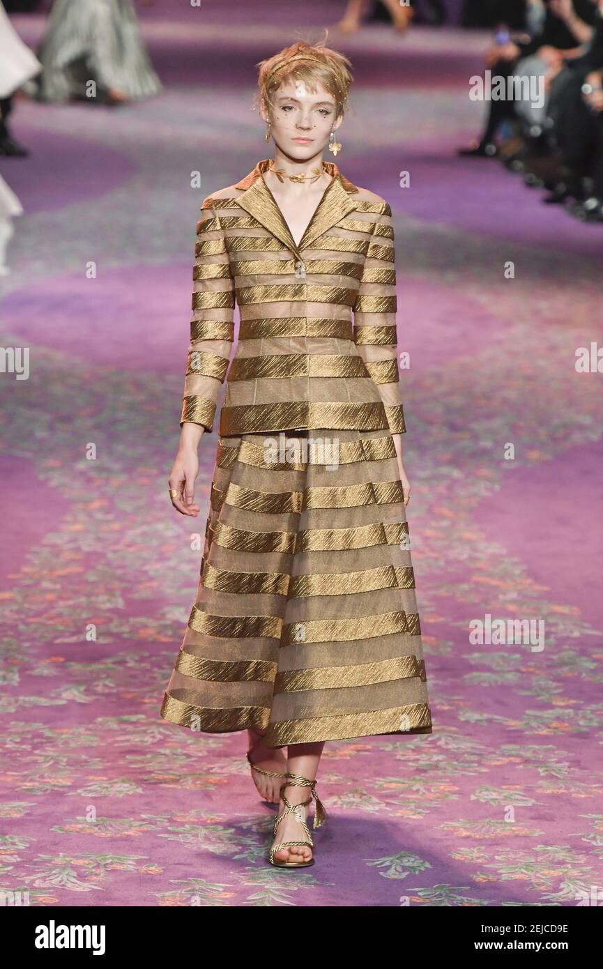 Model walks on the runway during the Dior Haute Couture fashion show ...