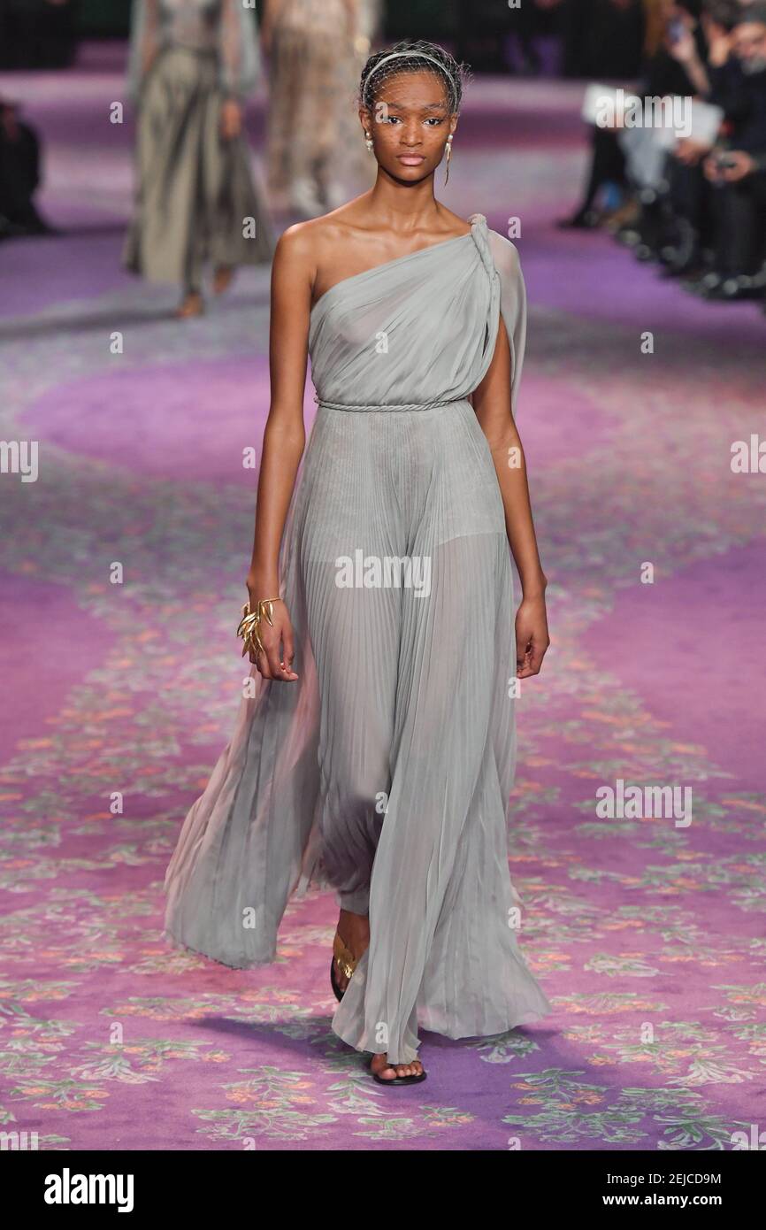 Model walks on the runway during the Dior Haute Couture fashion show ...