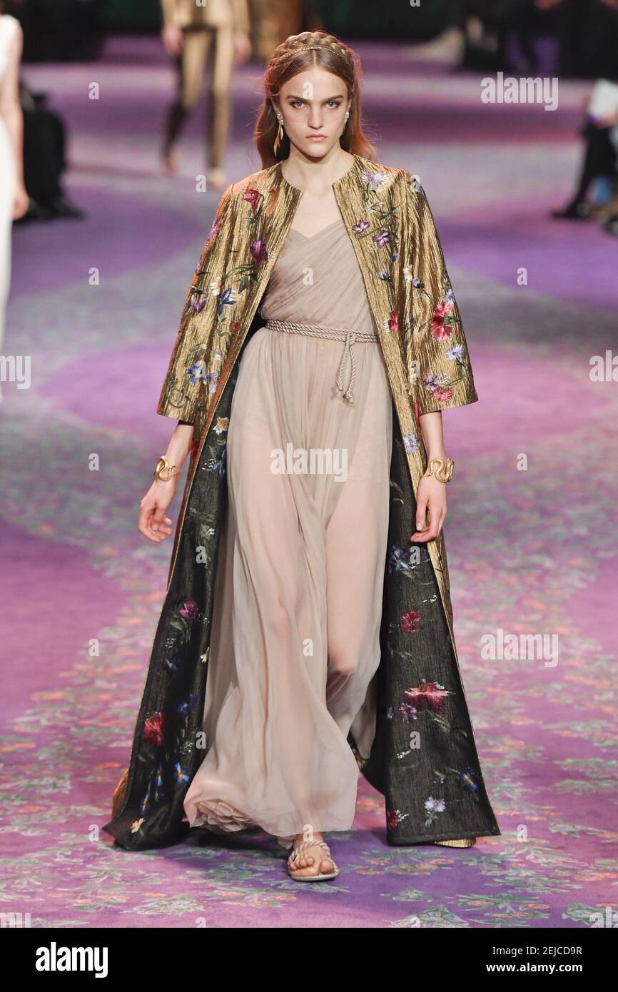 Model walks on the runway during the Dior Haute Couture fashion show ...