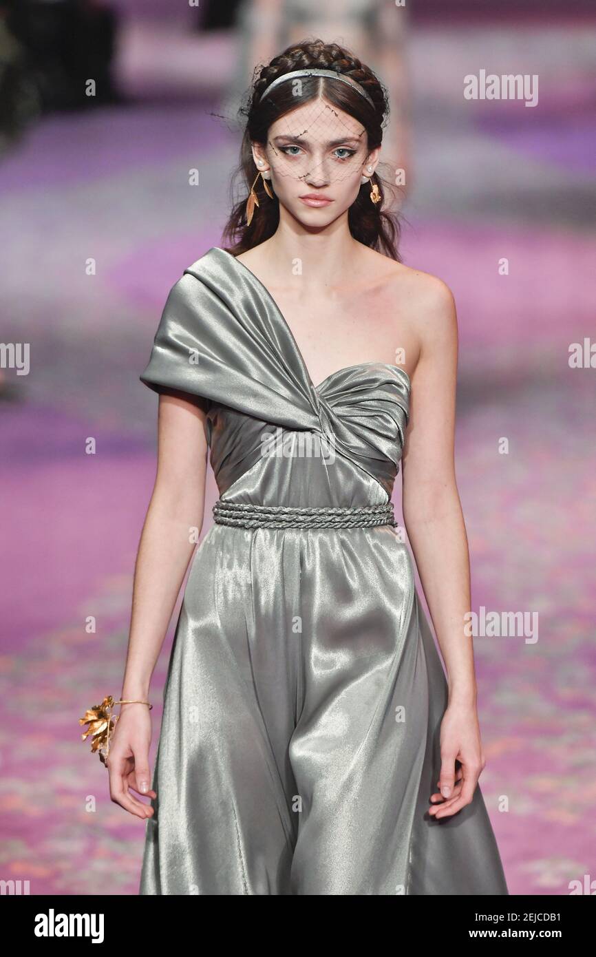 Model walks on the runway during the Dior Haute Couture fashion show ...