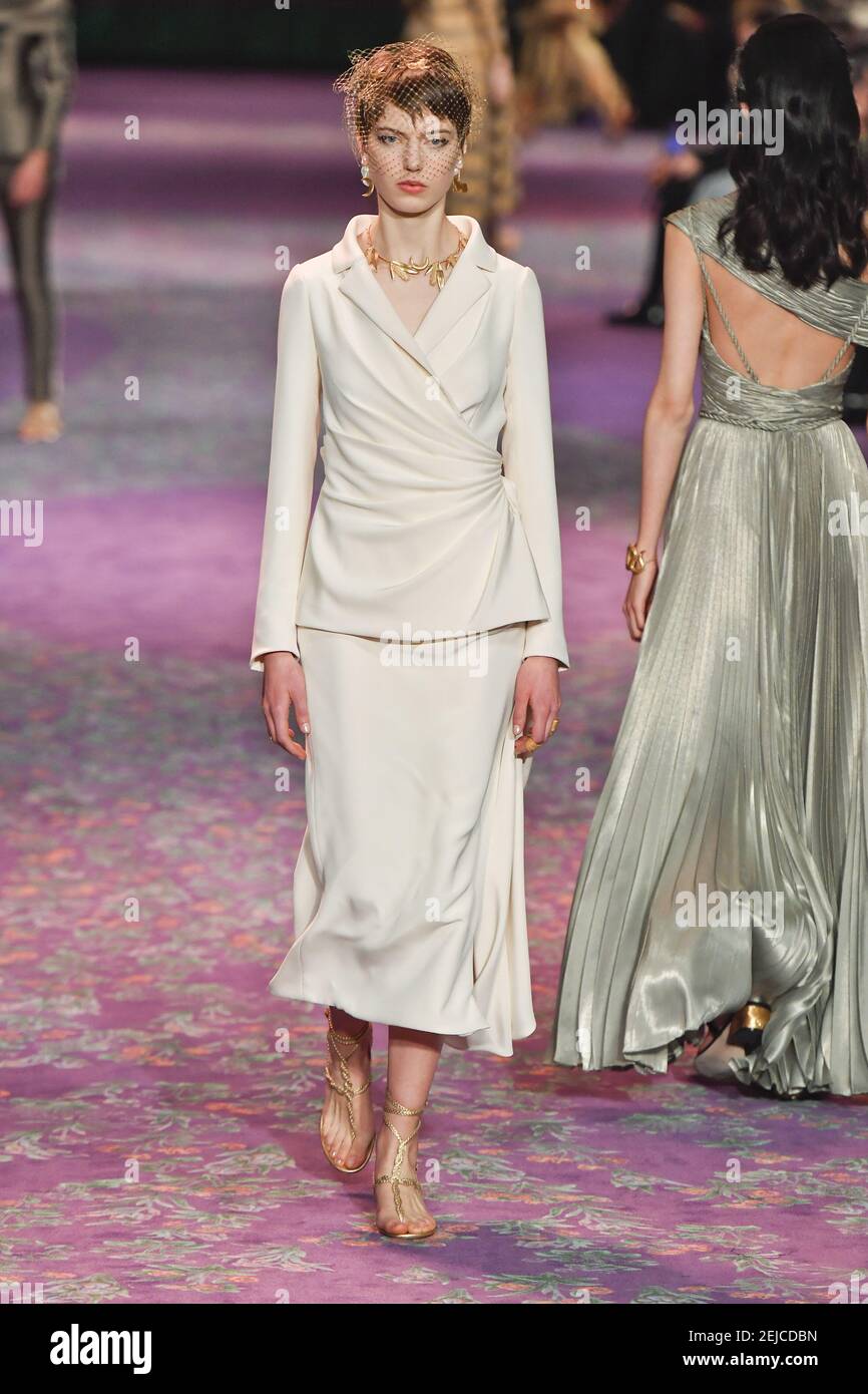 Model walks on the runway during the Dior Haute Couture fashion show ...