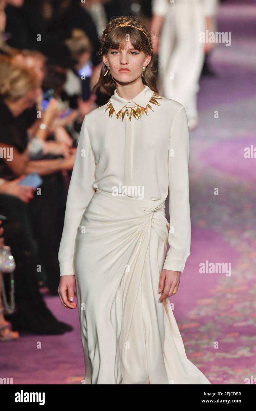 Model walks on the runway during the Dior Haute Couture fashion show ...