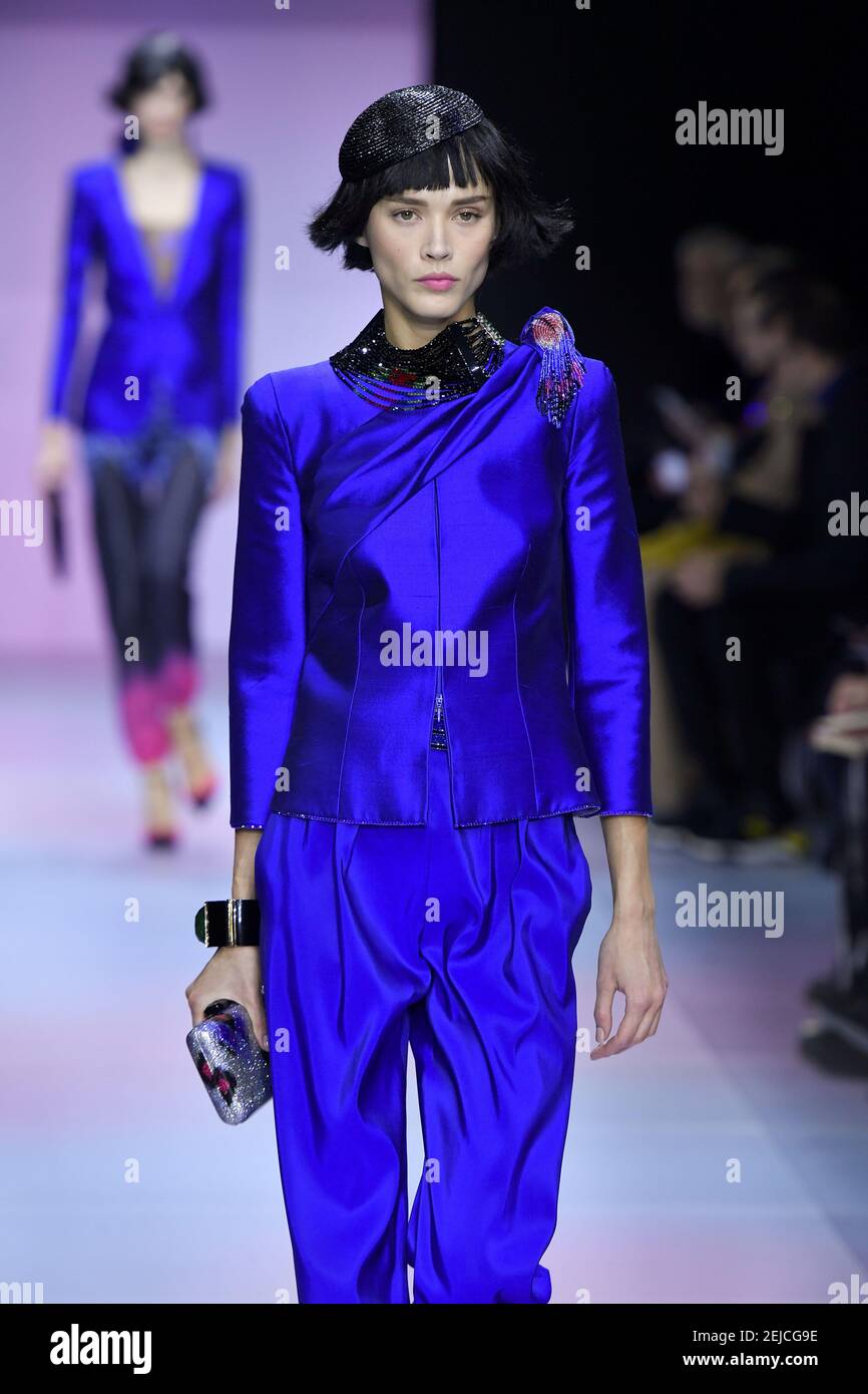 Model walks on the runway during the Giorgio Armani Prive Haute Couture ...