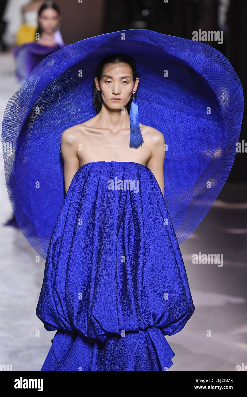 Model Lina Zhang walks on the runway during the Givenchy Haute Couture ...