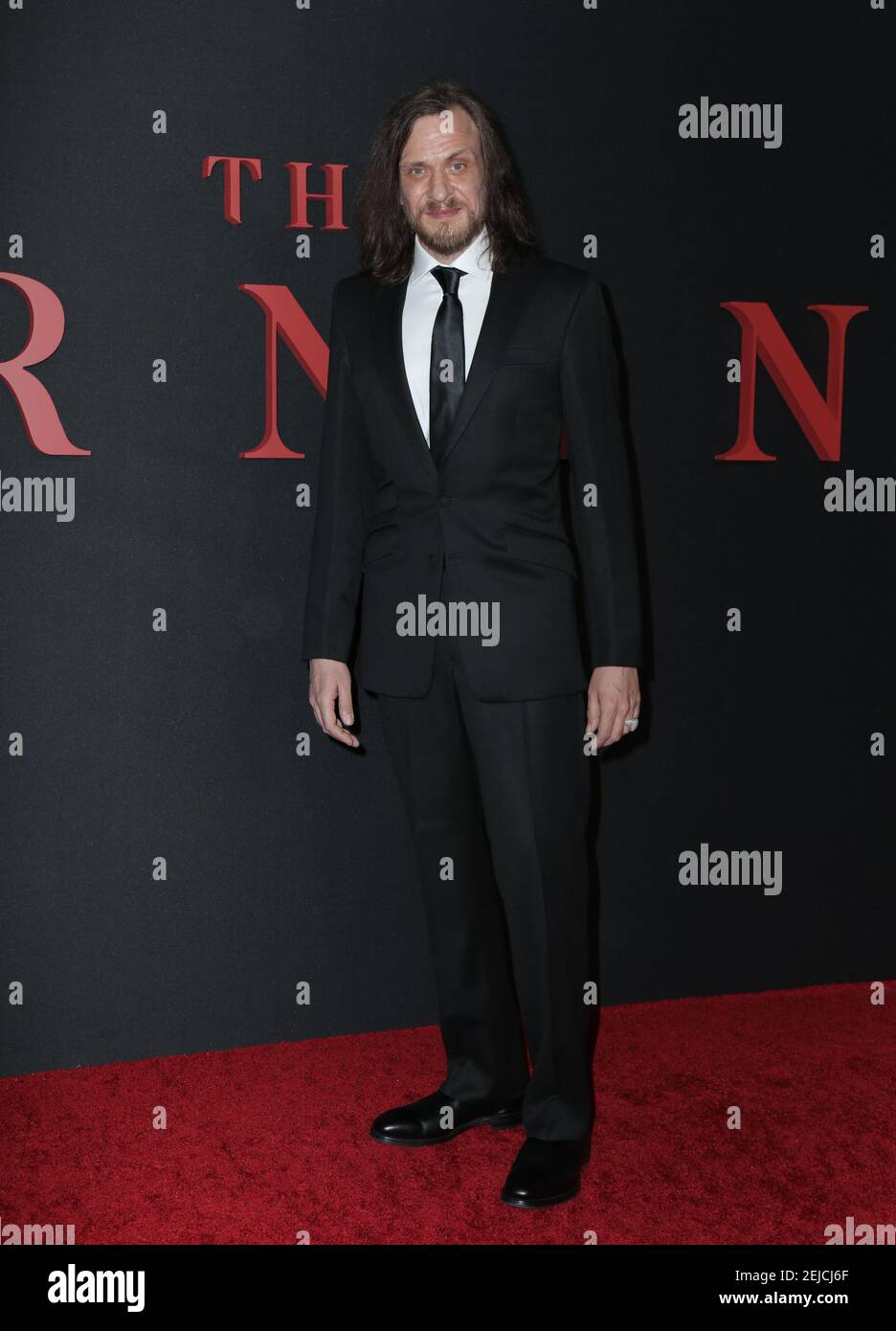 Niall Greig Fulton walking the red carpet at the Premiere of Universal ...