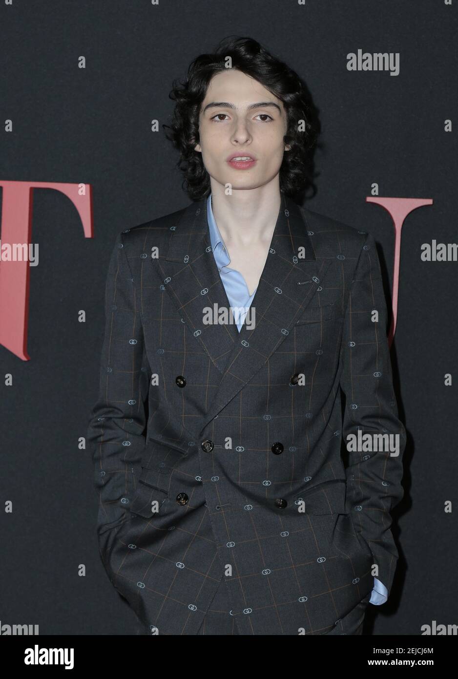 Finn Wolfhard walking the red carpet at the Premiere of Universal ...