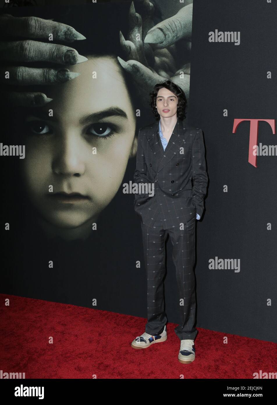 Finn Wolfhard walking the red carpet at the Premiere of Universal ...