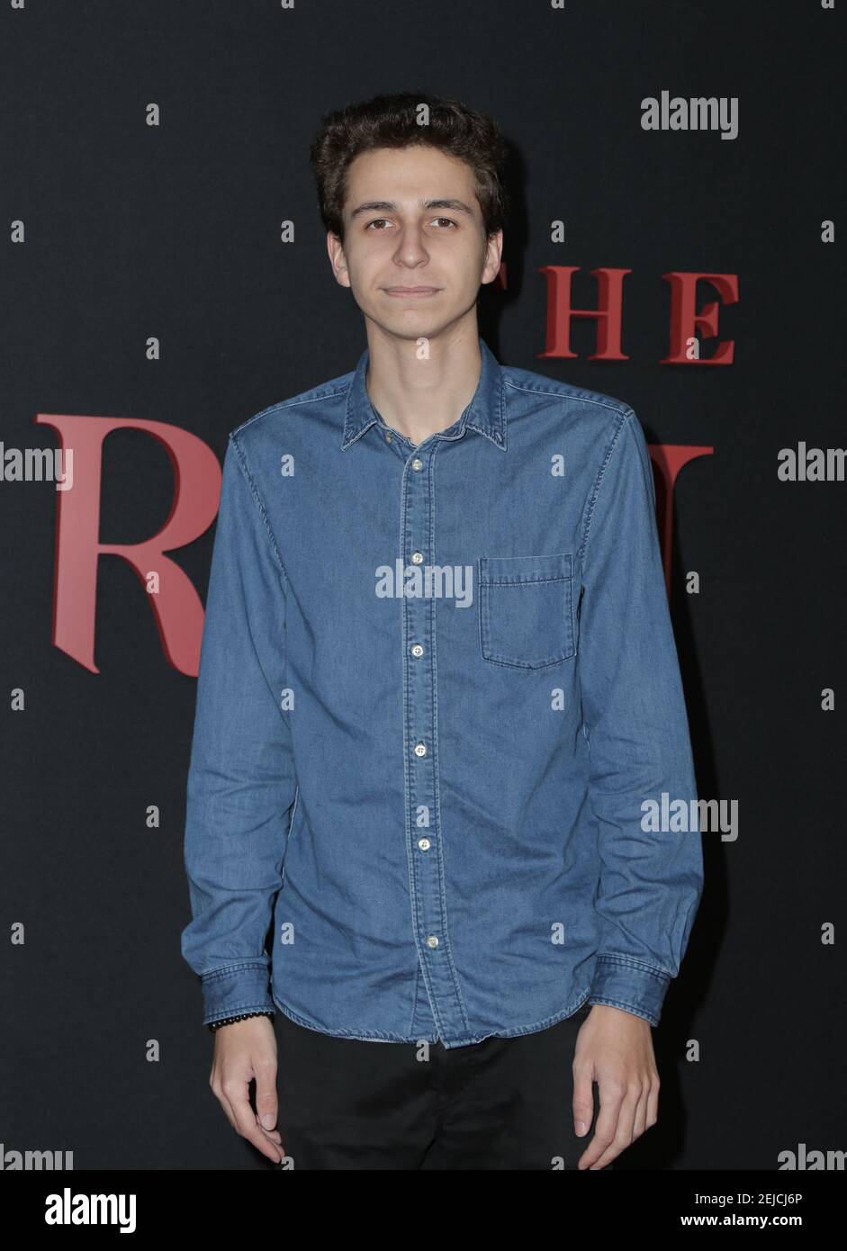 Gabe Erwin walking the red carpet at the Premiere of Universal Pictures ...