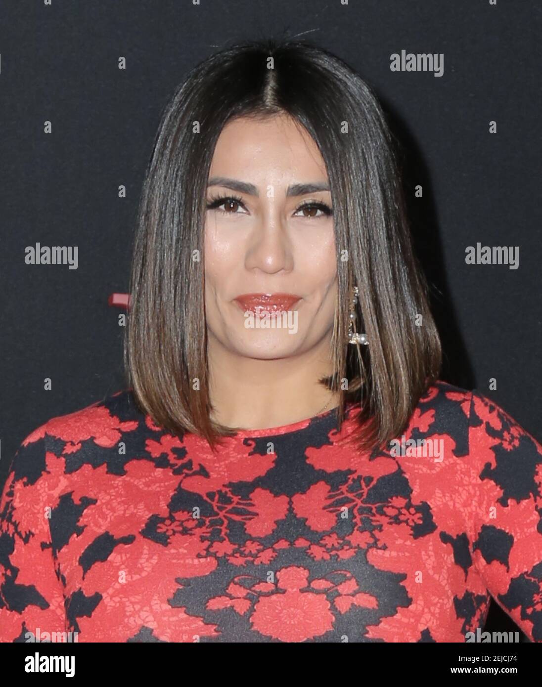 Sandra Gutierrez walking the red carpet at the Entertainment Weekly Pre ...